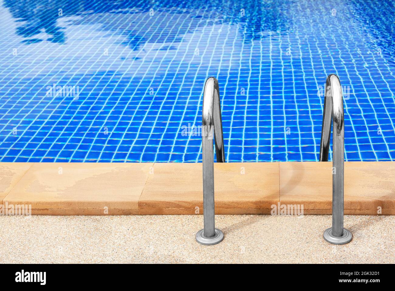Swimming pool entrance stair closeup, metal grab bar ladder, swimming ...