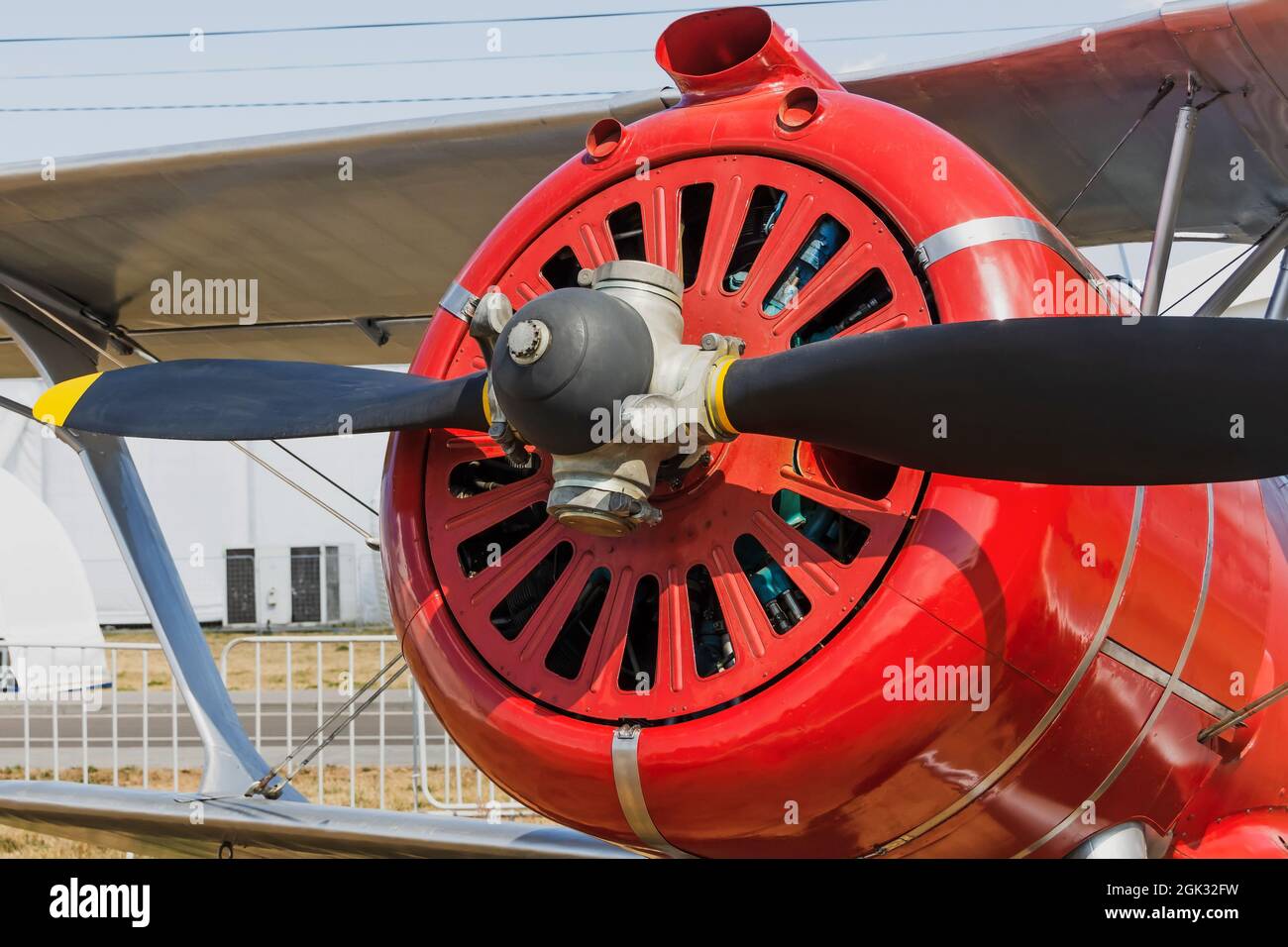 Propeller and engine of historical vintage red airplane Stock Photo - Alamy