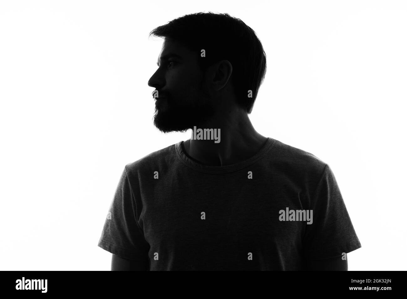 bearded man in the shadows anonymity studio mystic Stock Photo - Alamy