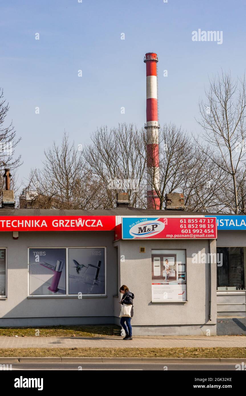 POZNAN, POLAND - Mar 25, 2018: A woman standing in front of an M&P ... POZNAN, POLAND - Mar 25, 2018: A woman standing in front of an M&P ...