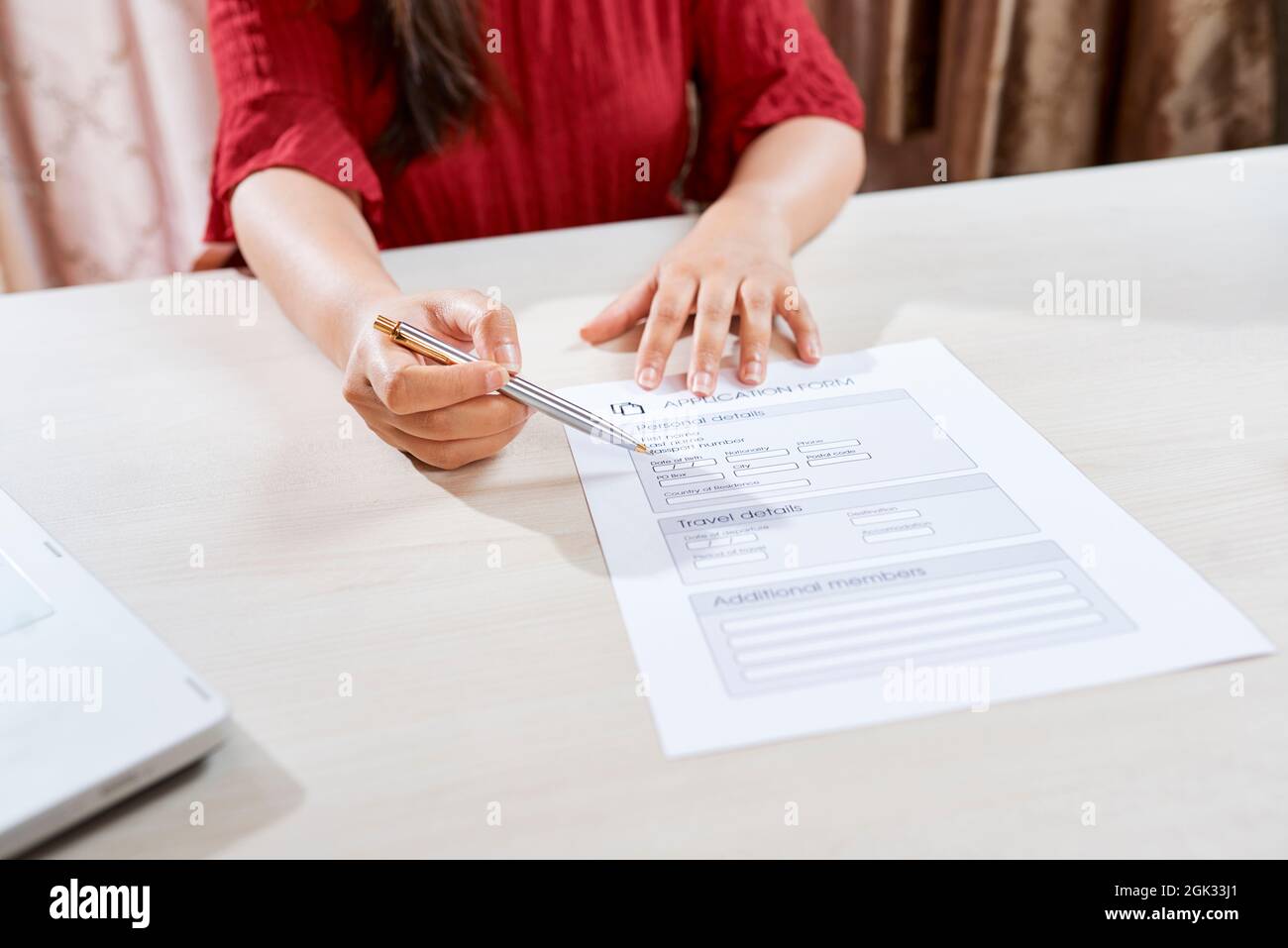 Manager asking customer to filling personal data in application form ...