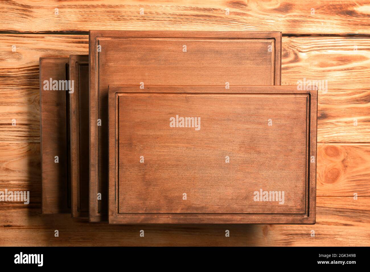 Stack of rectangular wooden boards on table Stock Photo - Alamy