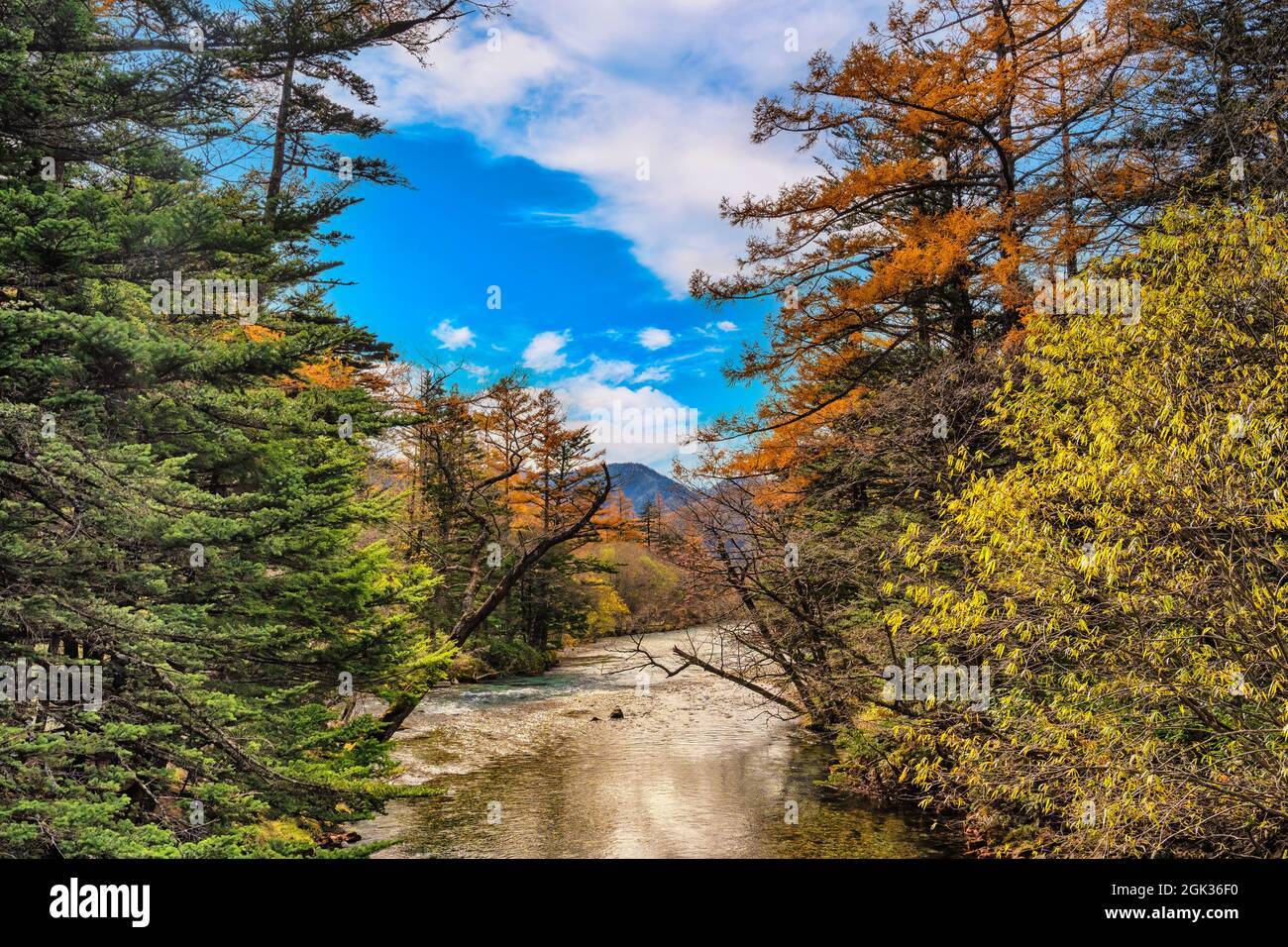 Nature landscape at Kamikochi Japan, autumn fall foliage with pond and ...