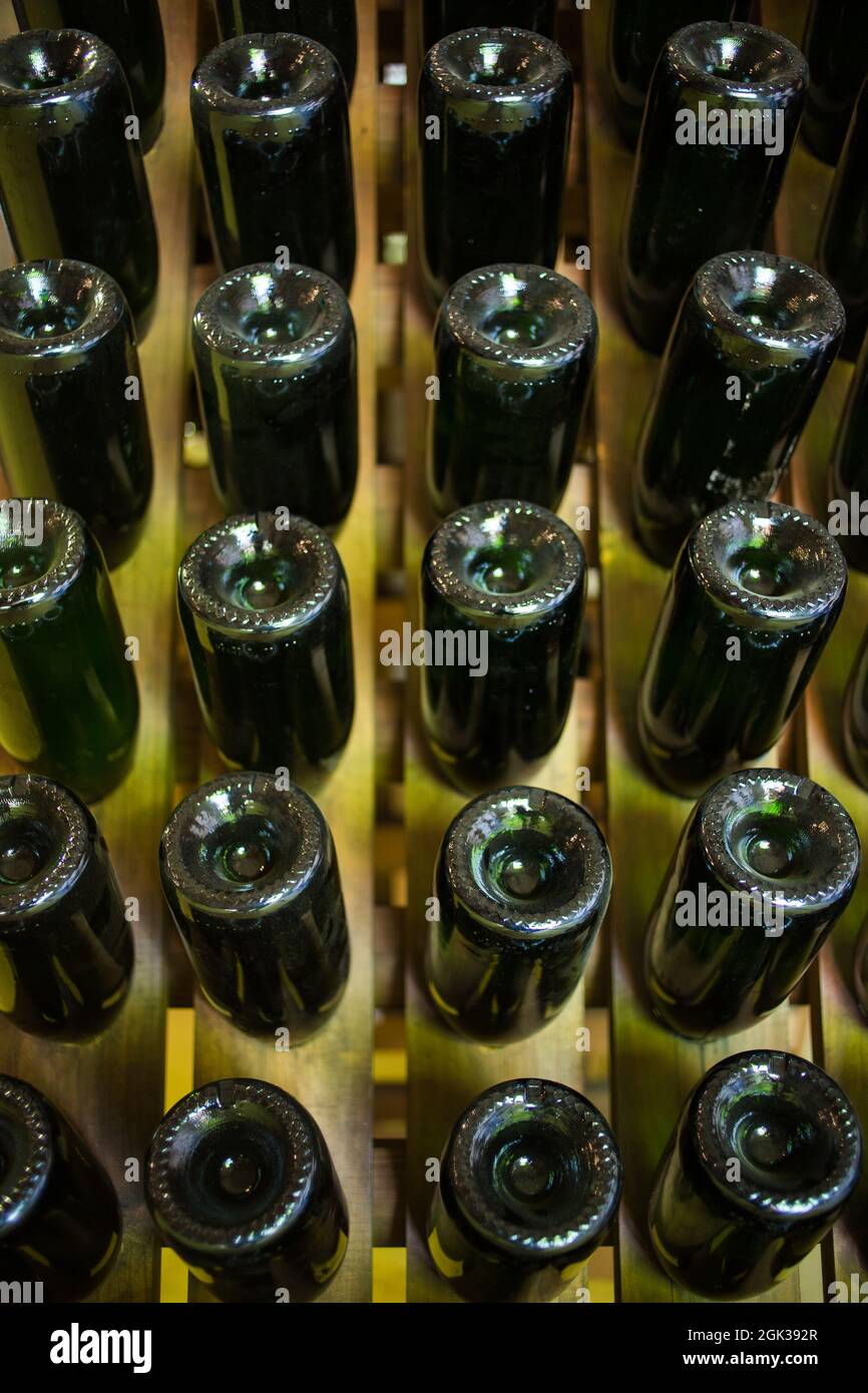 Empty wine bottles in rack hi-res stock photography and images - Alamy