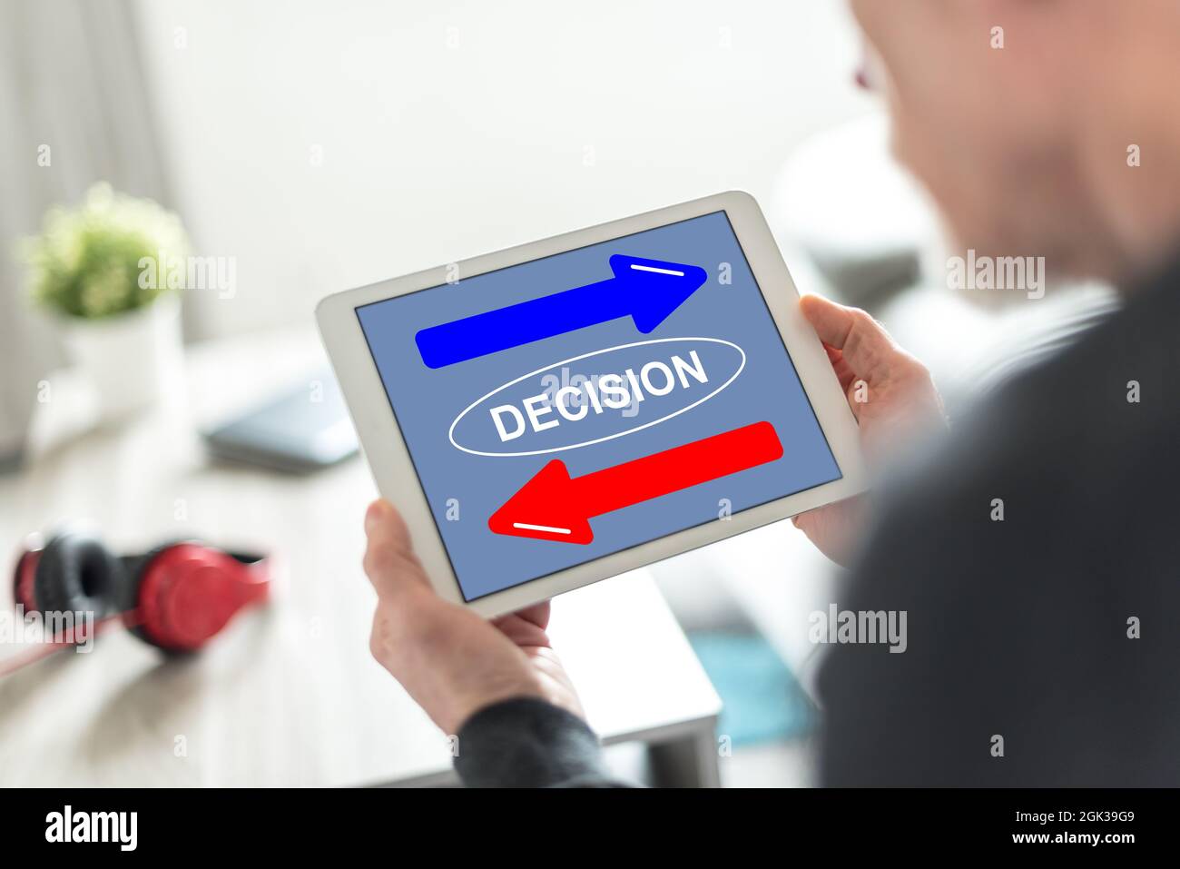 Tablet screen displaying a decision concept Stock Photo - Alamy