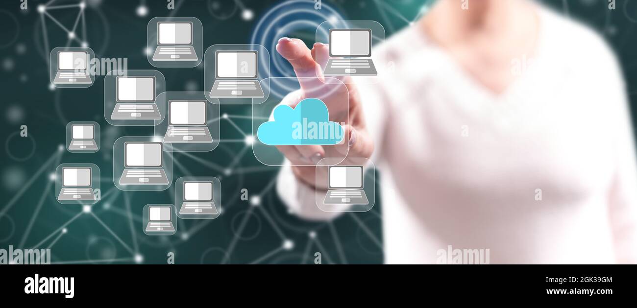 Woman touching a cloud computing concept on a touch screen with her ...