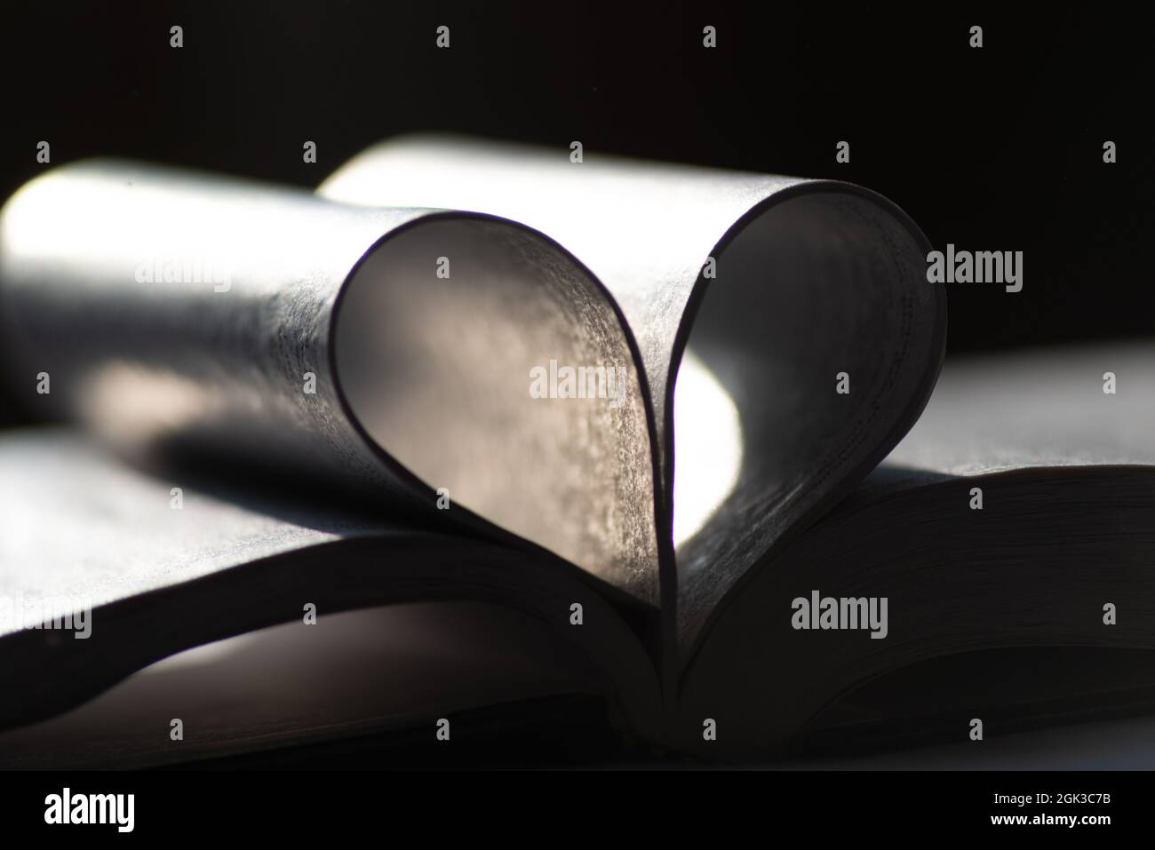 heart shaped book pages with ring Stock Photo - Alamy