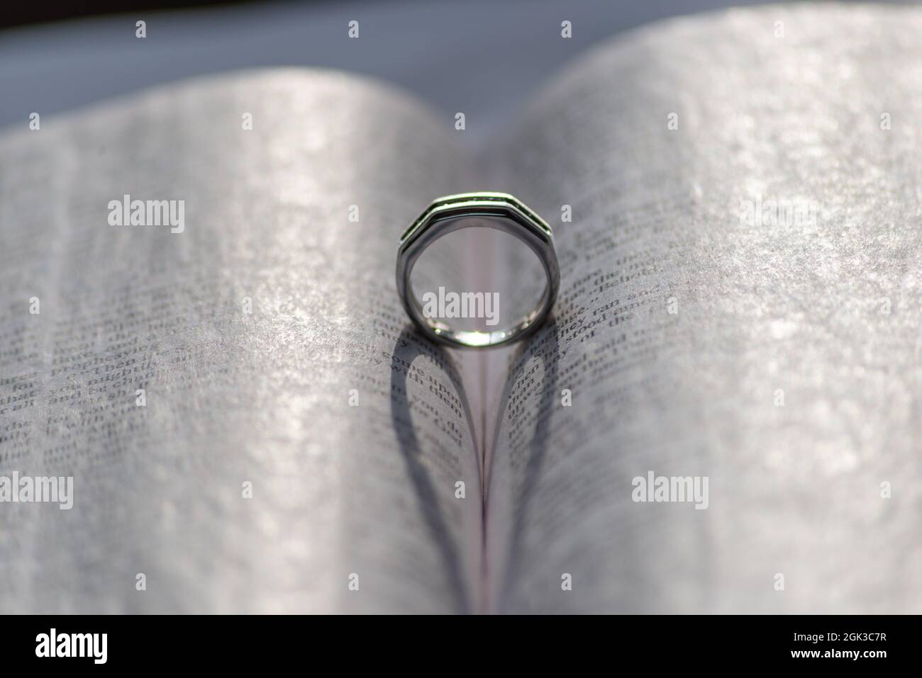heart shaped book pages with ring Stock Photo - Alamy