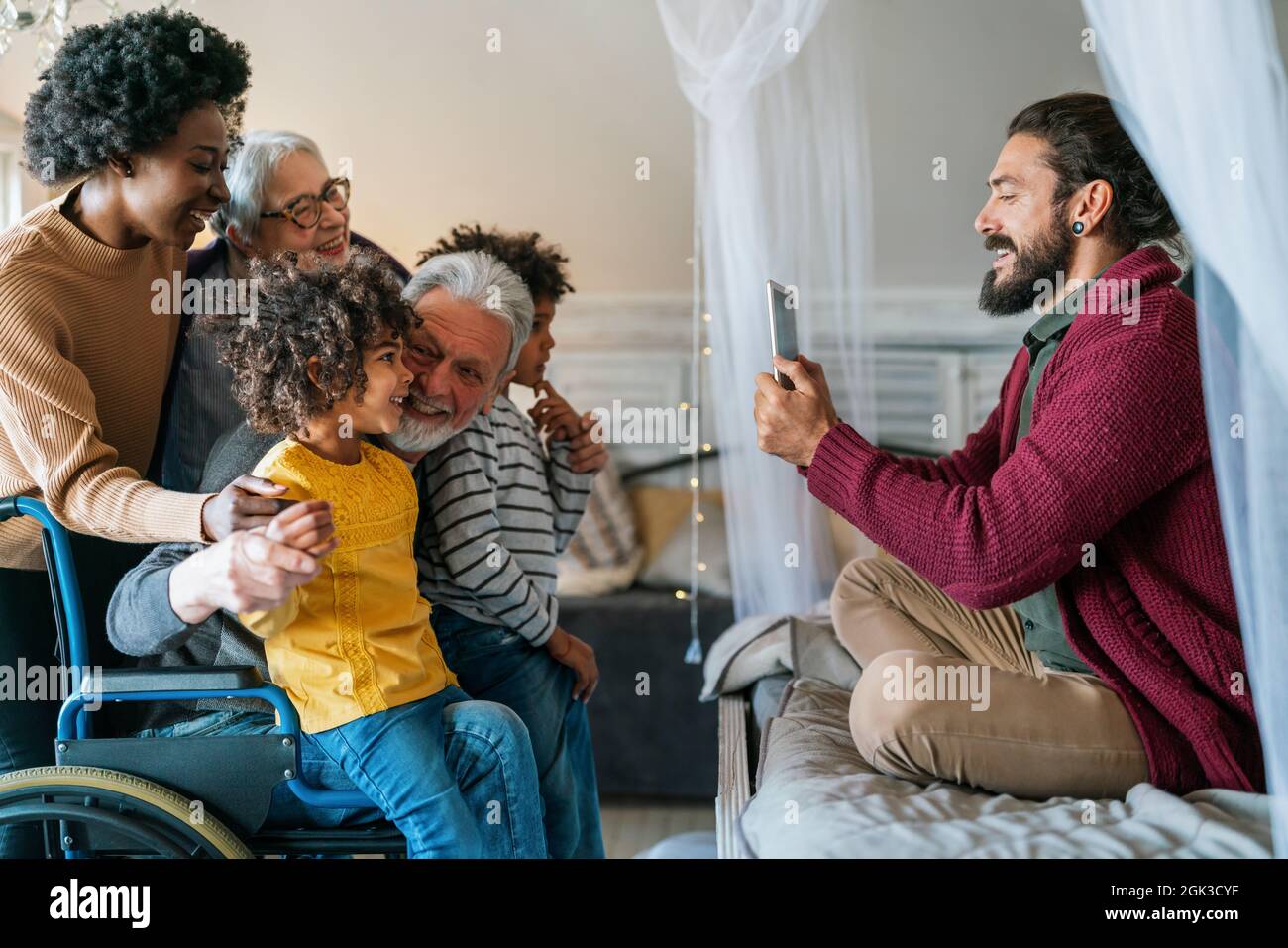 Portrait of happy multi-generation multiethnic family having fun ...