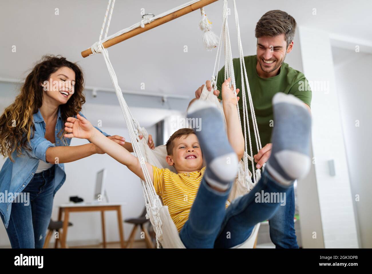 Happy family having fun time at home Stock Photo - Alamy