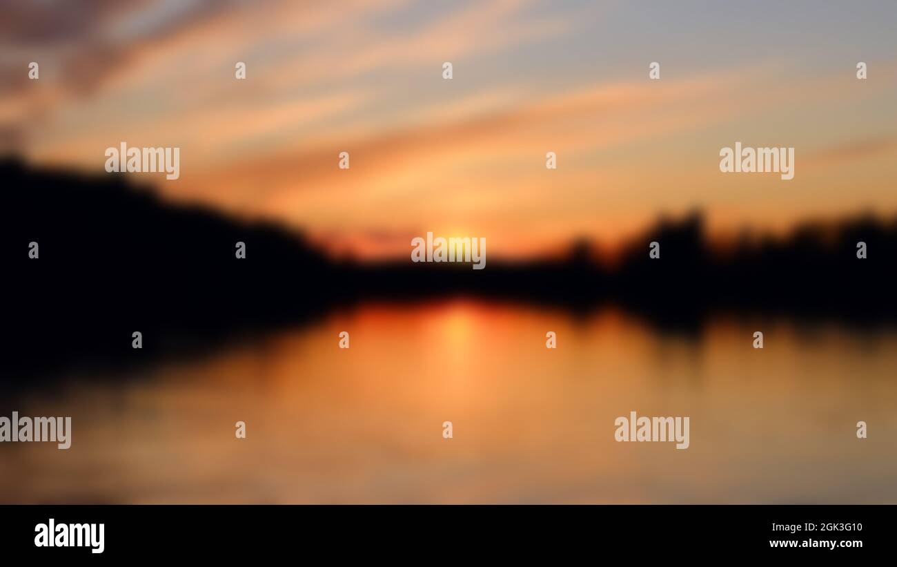 lake at sunset. blurred image. background for design. High quality ...