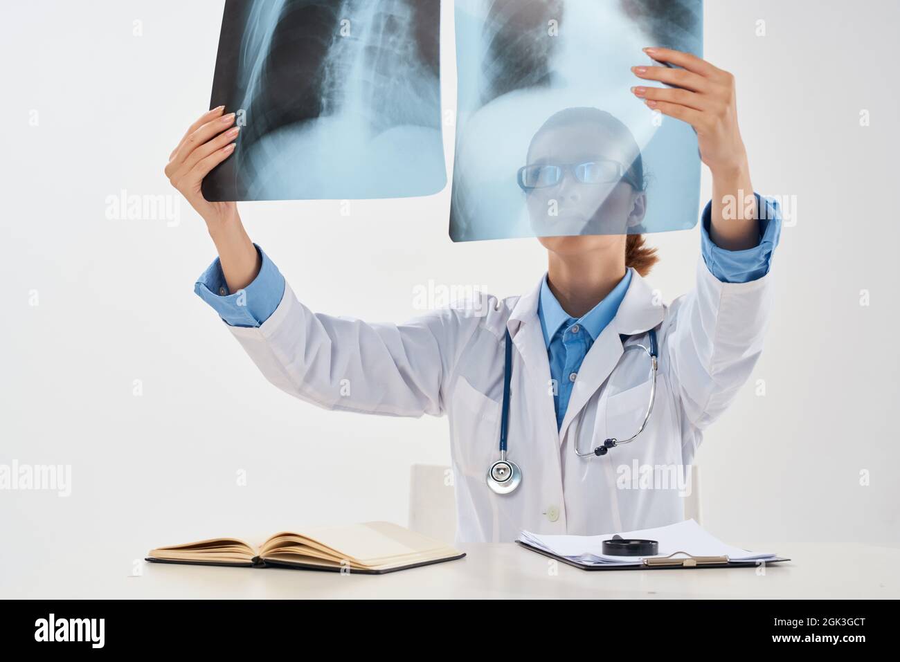 Woman in white coat radiologist research x-ray health Stock Photo - Alamy