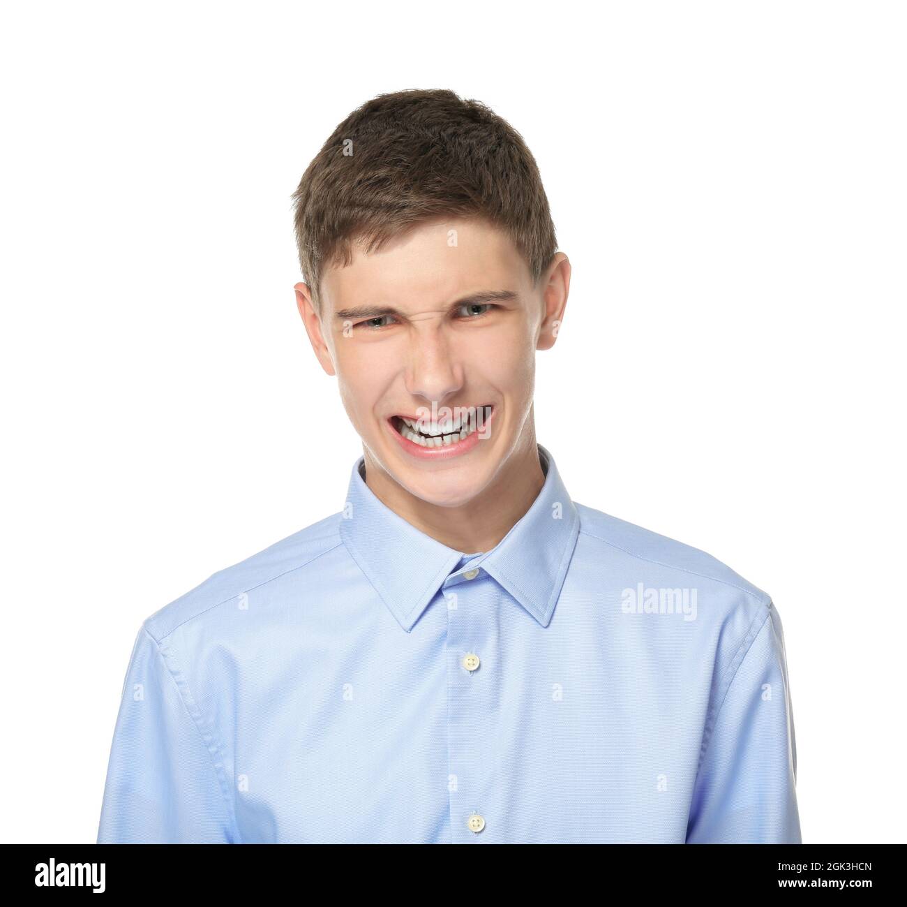 Angry teenager on white background Stock Photo - Alamy