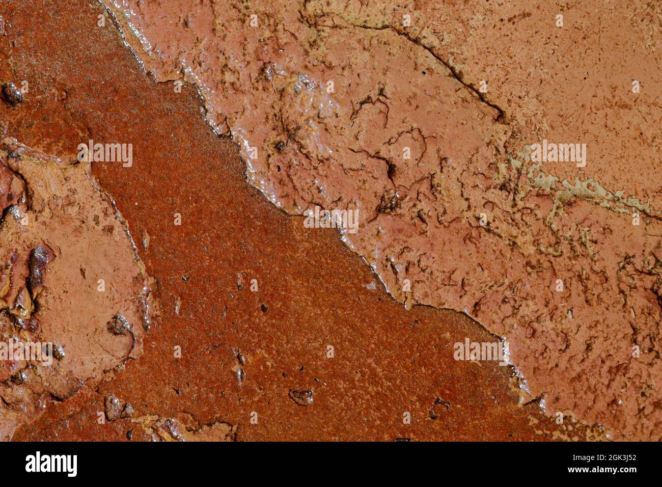 Rustic abstract close-up of natural African earthy red brown stone tile ...