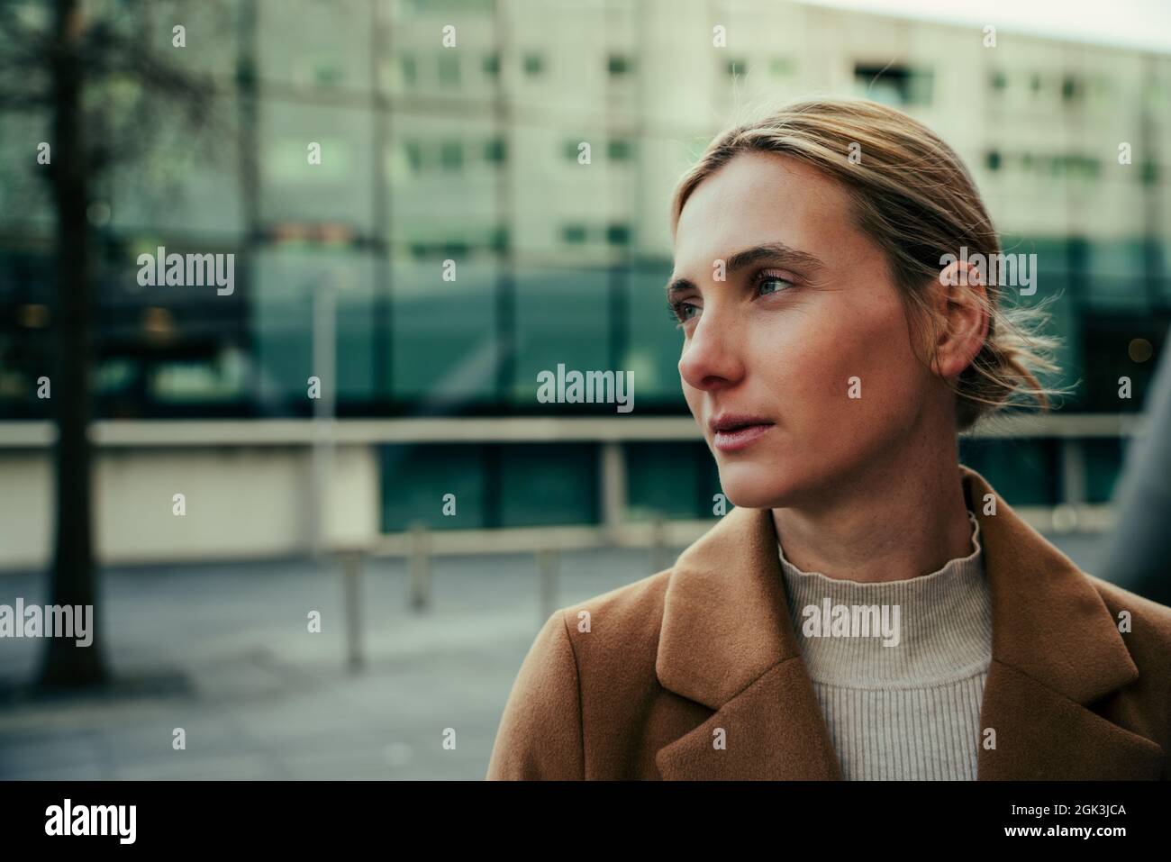 Caucasian female student dressed elegantly walking to university acting ...