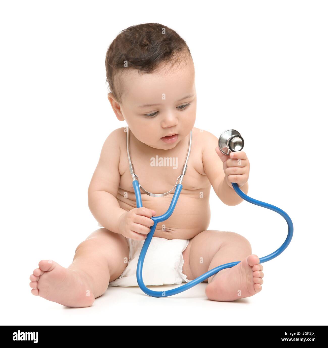 Cute little baby with stethoscope on white background. Health care ...