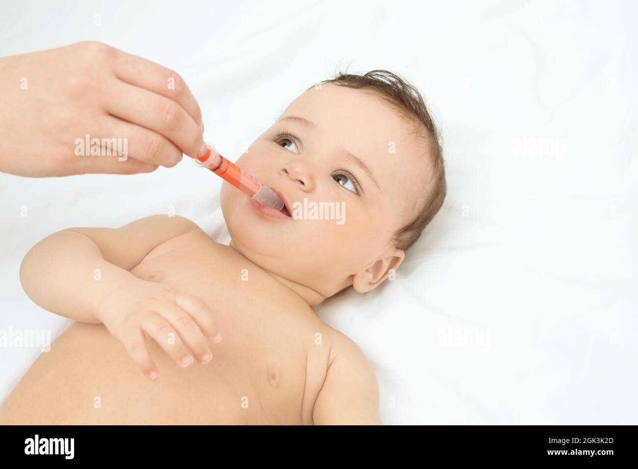 Baby medicine oral syringe hi-res stock photography and images - Alamy