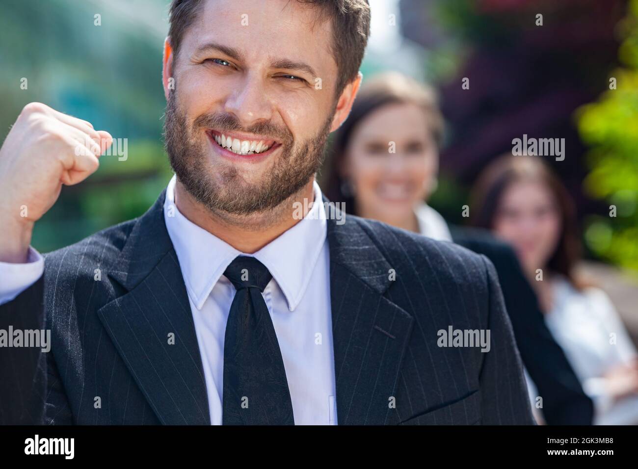 Young successful man, male executive businessman celebrating success ...