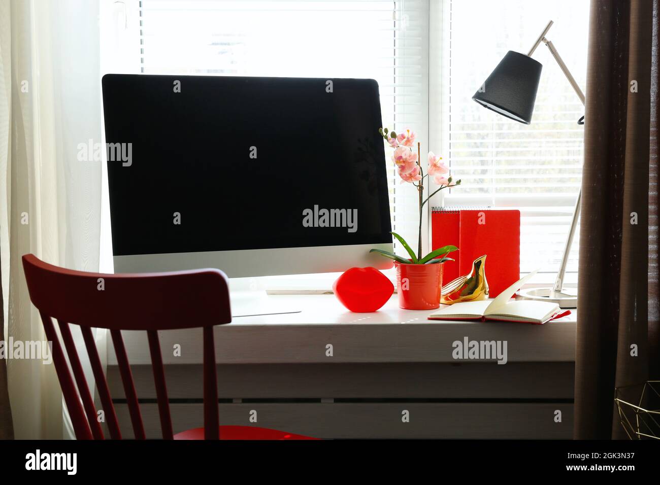 Modern comfortable workplace with computer on window sill at home Stock ...