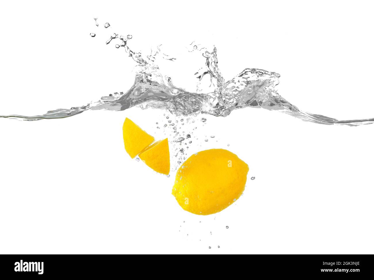 Fresh lemon in water on white background Stock Photo - Alamy