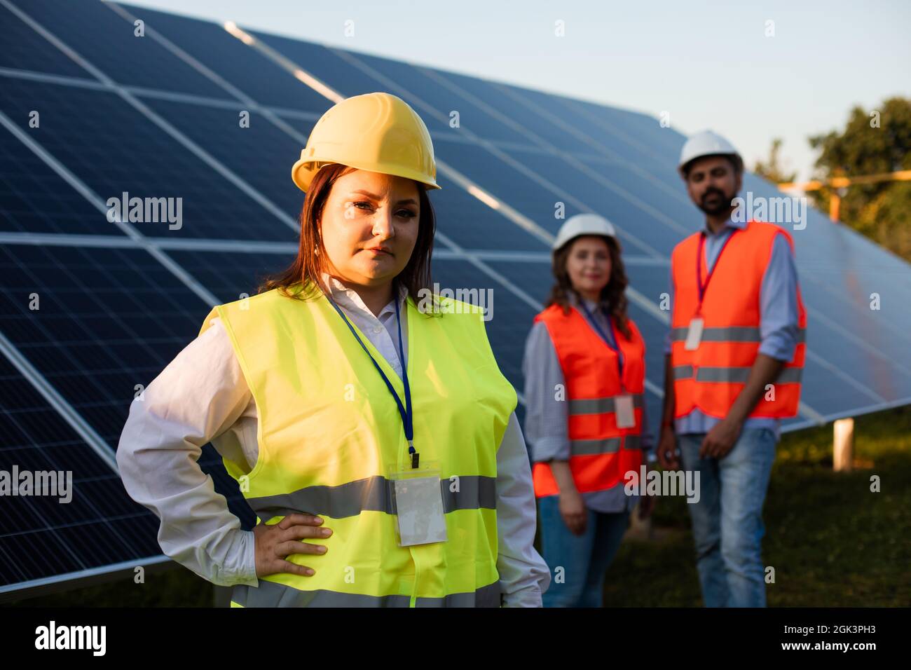 Overweight woman engineer posing at the solar station Stock Photo - Alamy