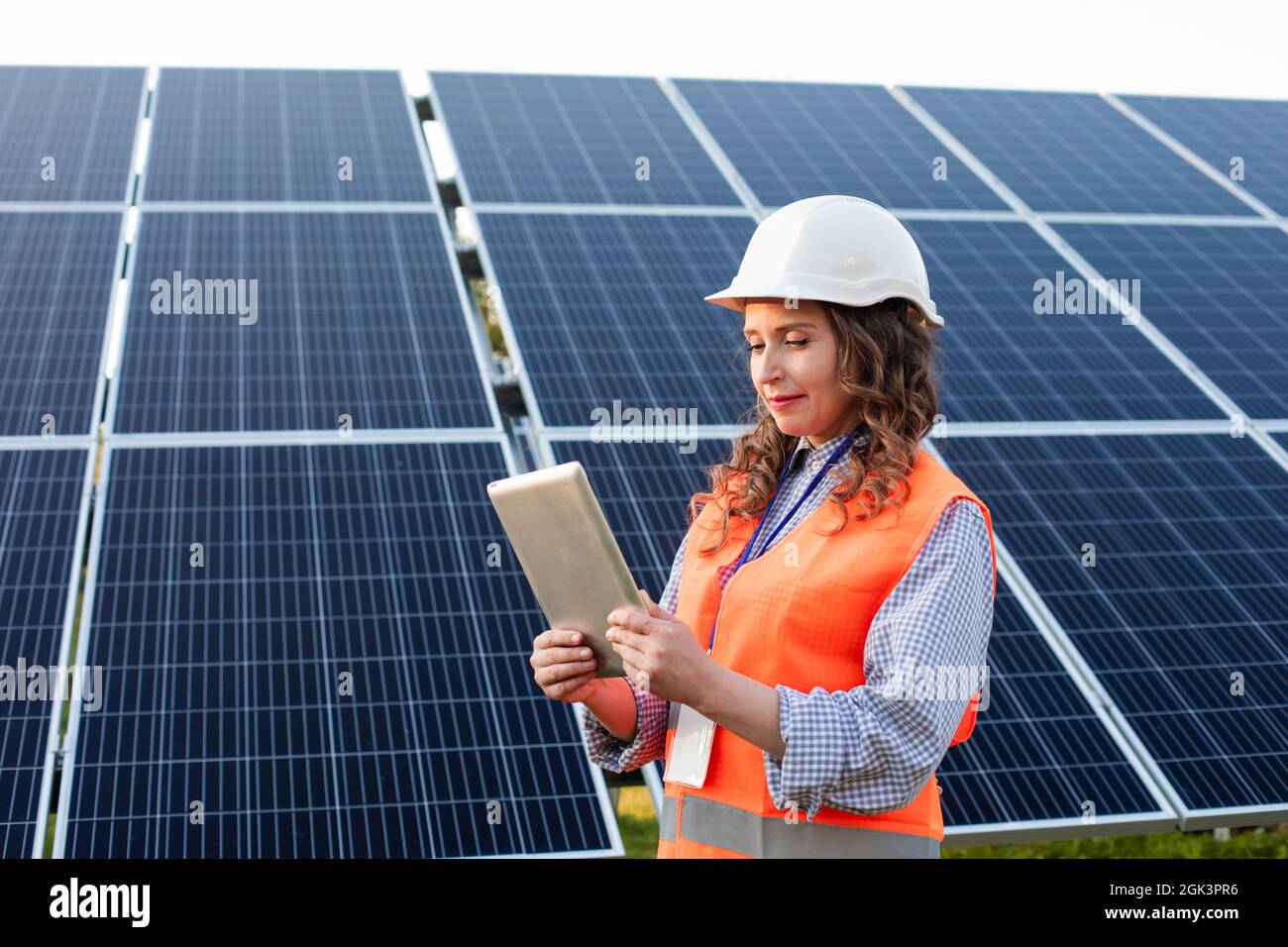 Solar panel technician using tablet hi-res stock photography and images ...