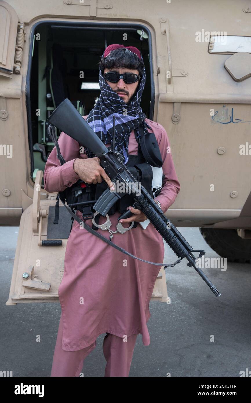 Taliban fighter guarding what used to be the green zone and inside the ...