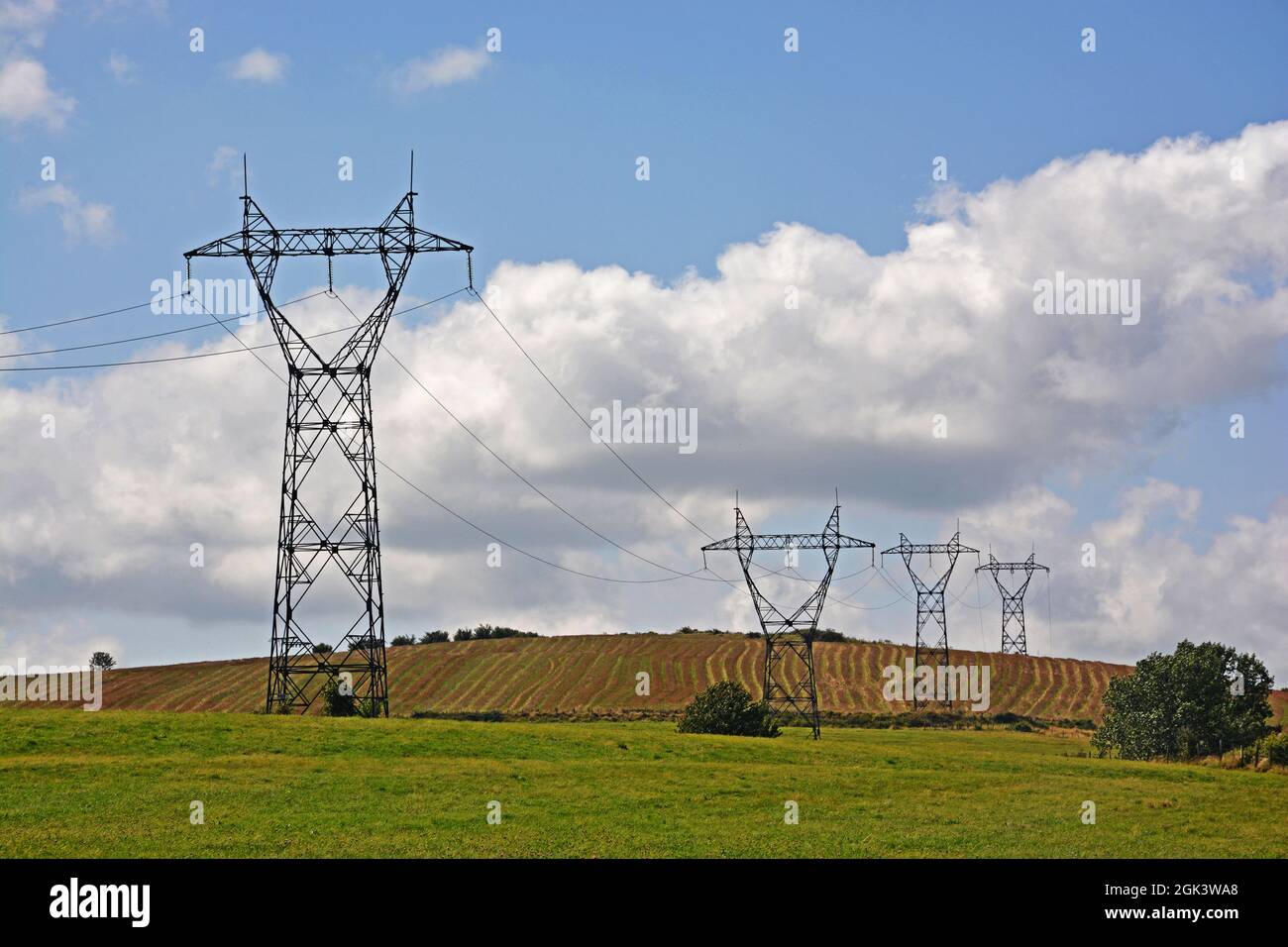 high voltage power lines in countryside, Cezallier, Puy-de-Dome ...