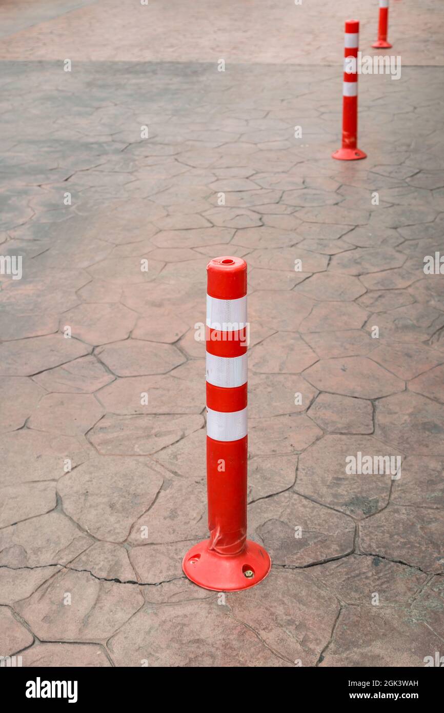 Traffic cone ,Orange bollard on the road in parking lot Stock Photo - Alamy