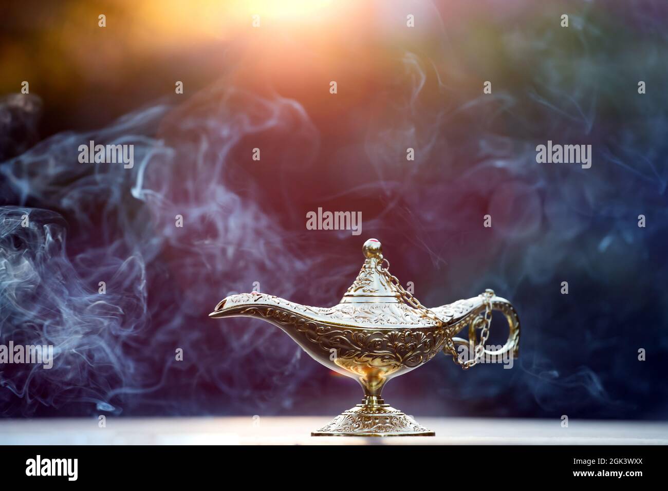 Magic lamp from the story of Aladdin in smoke concept for wishing, luck ...