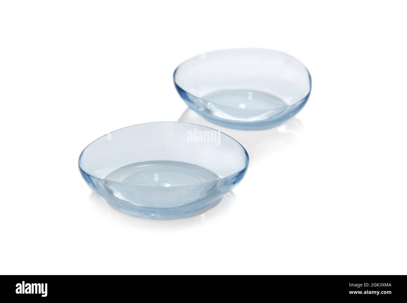 Contact lenses on white background Stock Photo - Alamy