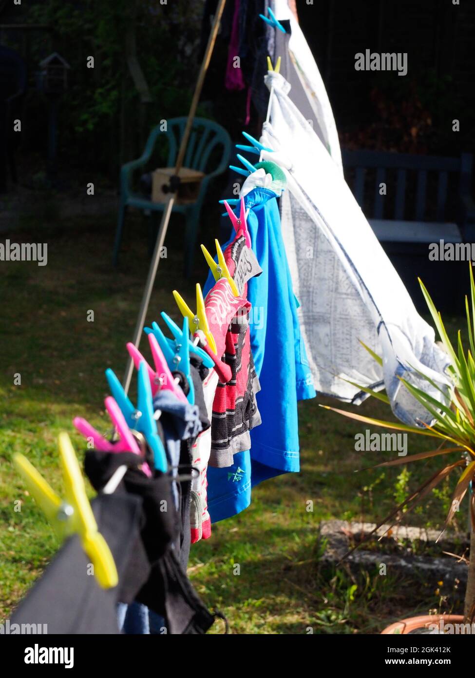 washing hanging on a washing line in a garden Stock Photo - Alamy