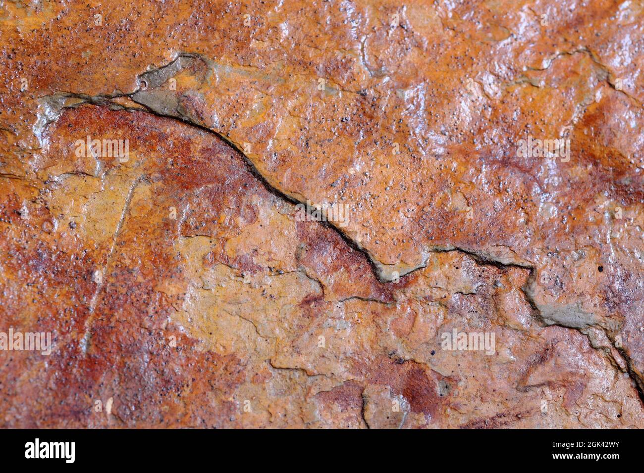 Rustic abstract close-up of natural African earthy multicolour stone ...