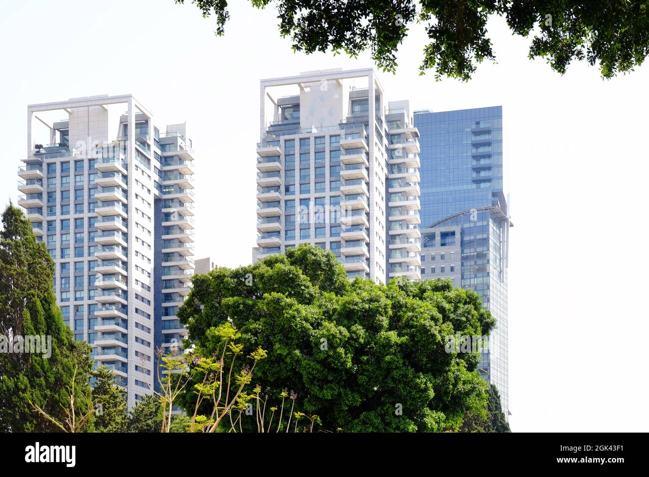 Tall houses on sky background Stock Photo - Alamy