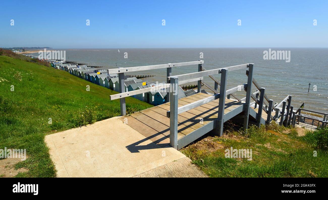 Wooden steps leading down to the sea , steps , beach huts, beach and ...