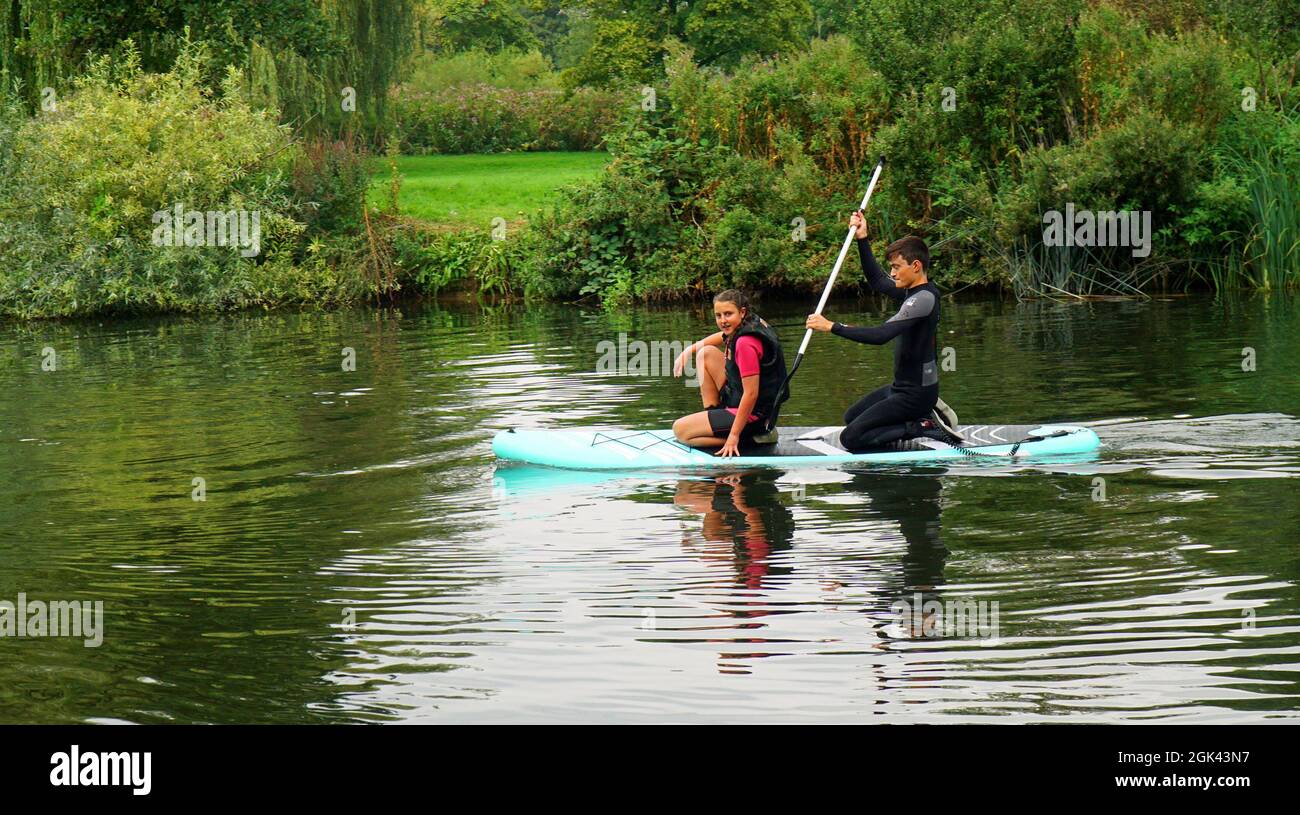 Woman paddle boarding river hi-res stock photography and images - Alamy