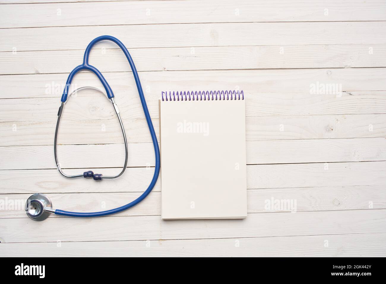 wooden background stethoscope notepad treatment medicine hospital Stock ...