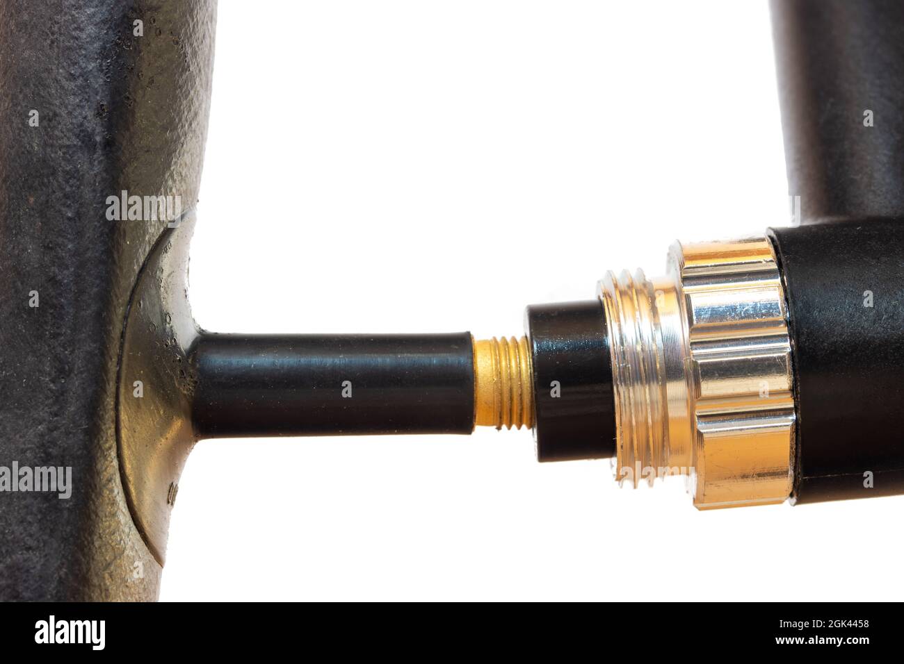 Close-up view of a pump blowing air into a valve of inner tube Stock ...