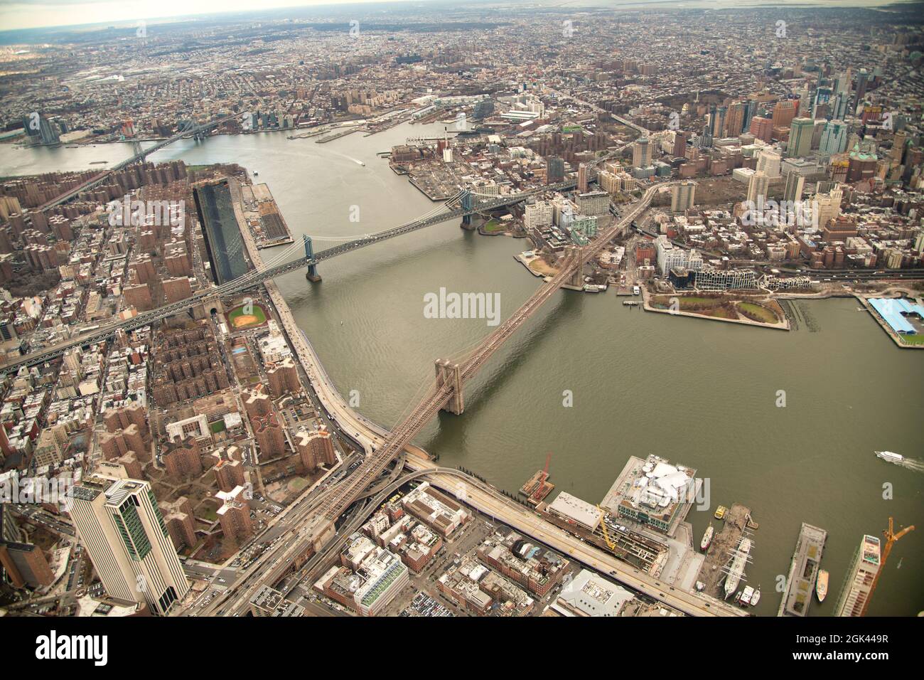 Brooklyn and Manhattan Bridges aerial view from helicopter, New York ...