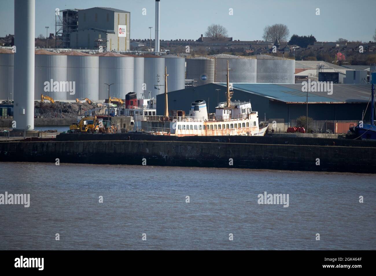 rusting boat in sandon half tide dock with united molasses storage ...