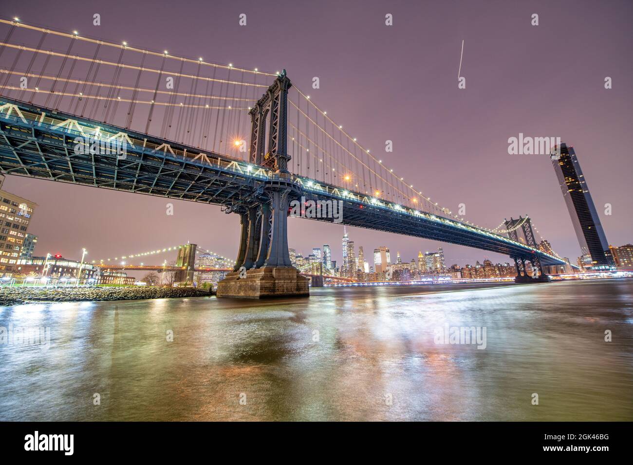 The Brooklyn and Manhattan Bridges at night from Broolyn Bridge Park ...