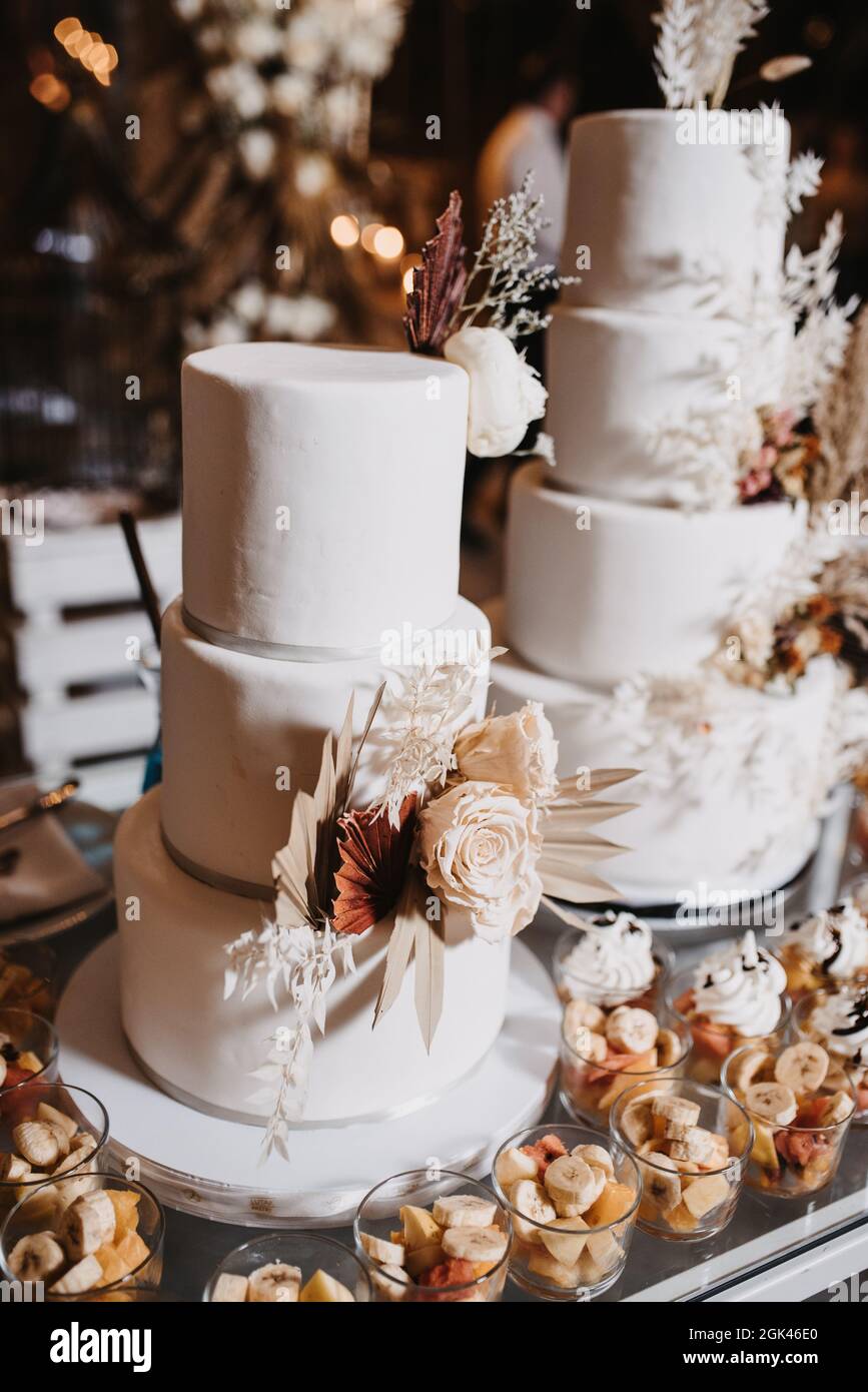 Vertical closeup of the wedding cakes with beautiful decorations Stock ...