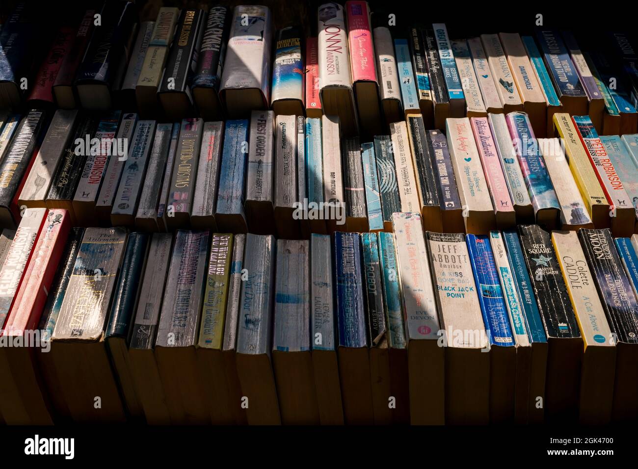 Shadow light of books Stock Photo - Alamy