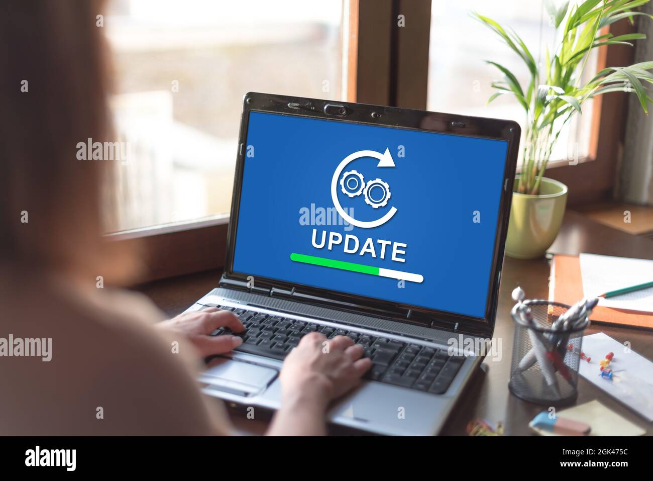 Laptop screen displaying an update concept Stock Photo - Alamy