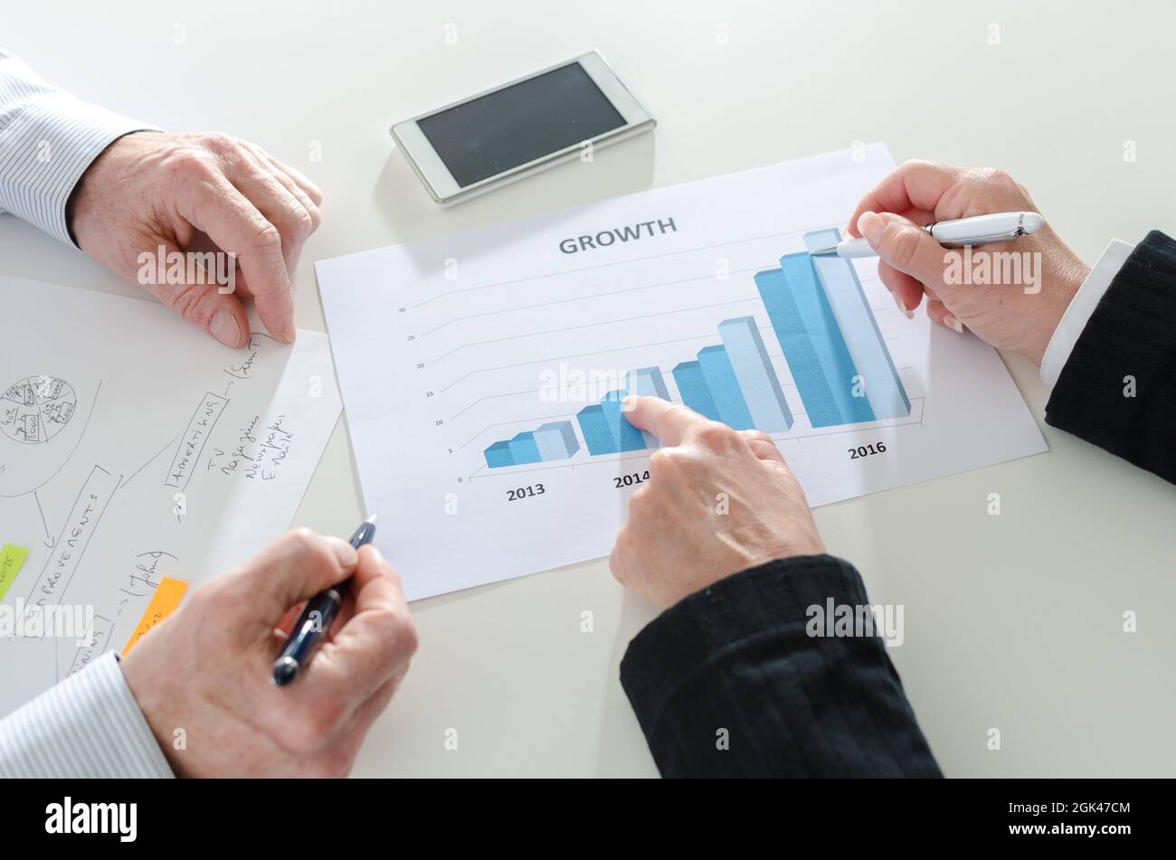 Analyzing growing results on a graphic Stock Photo - Alamy