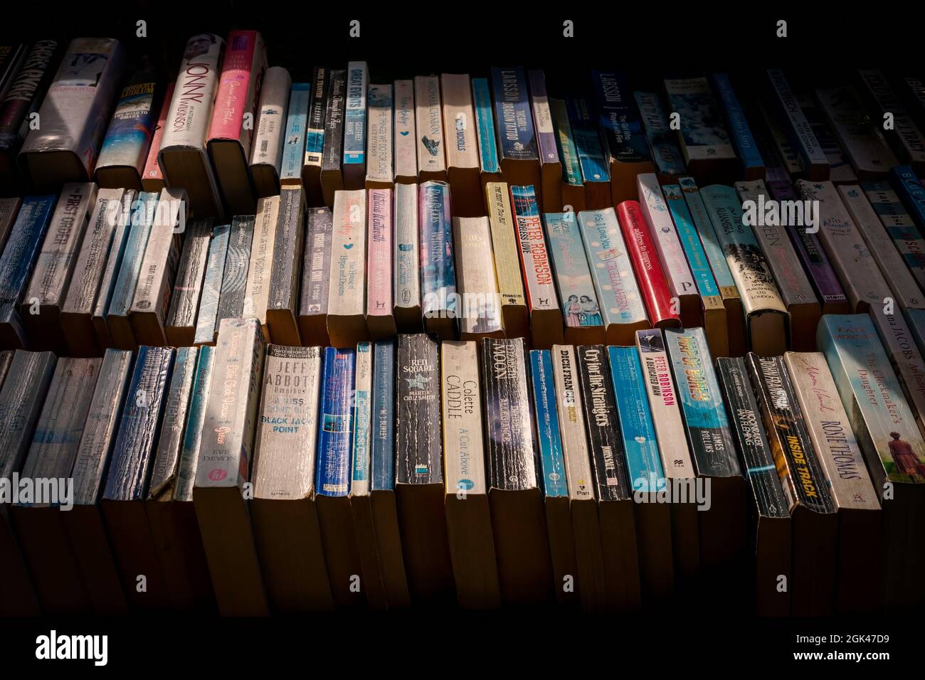 Shadow light of books Stock Photo - Alamy