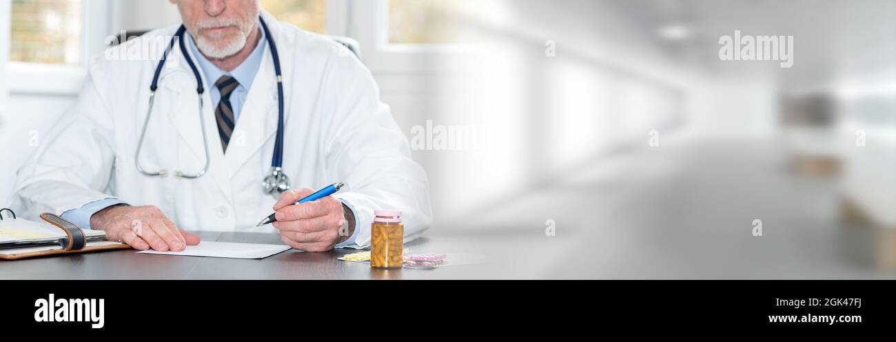 Doctor writing prescription in his office Stock Photo - Alamy