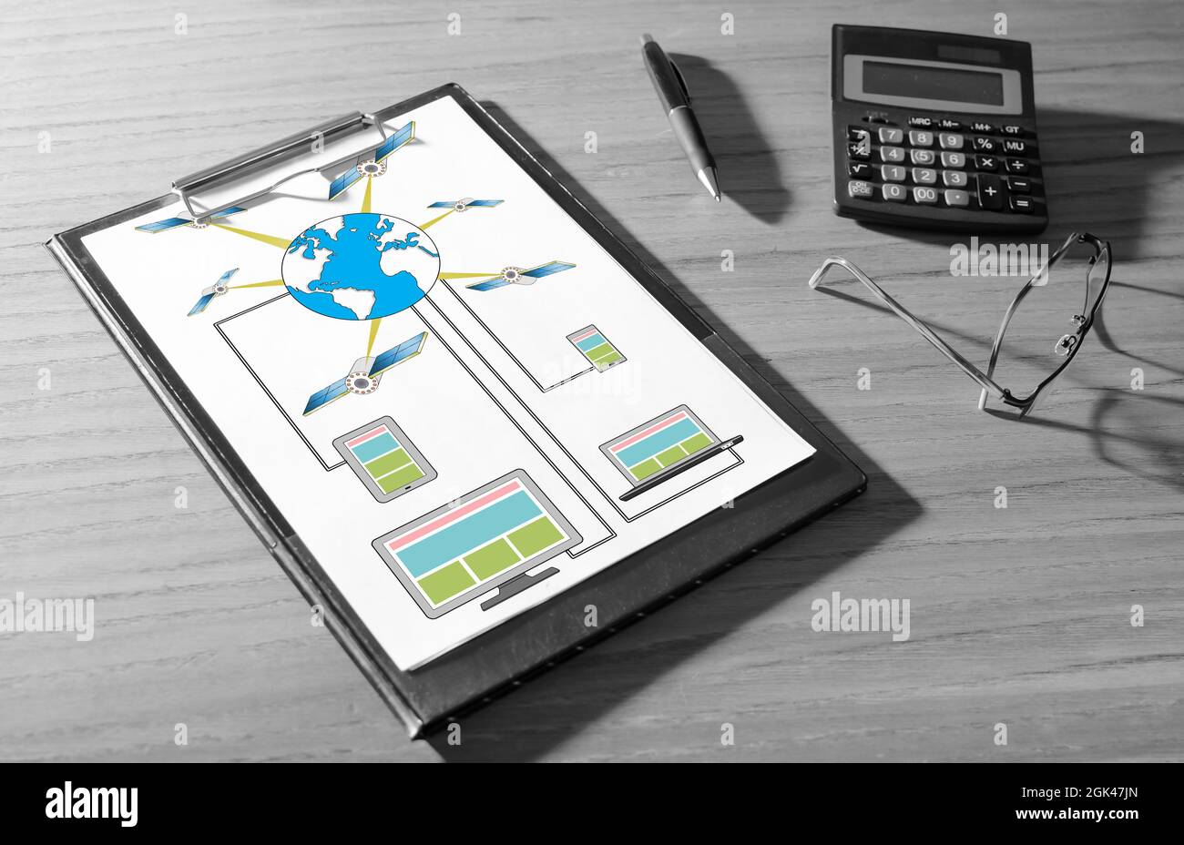 Satellite network concept on a clipboard with a calculator Stock Photo ...