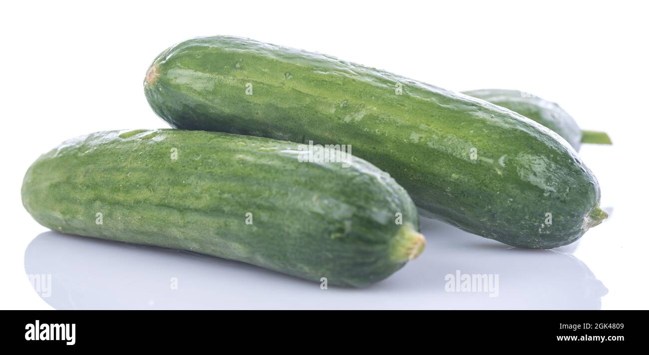 Fresh mini cucumbers, isolated on white Stock Photo - Alamy
