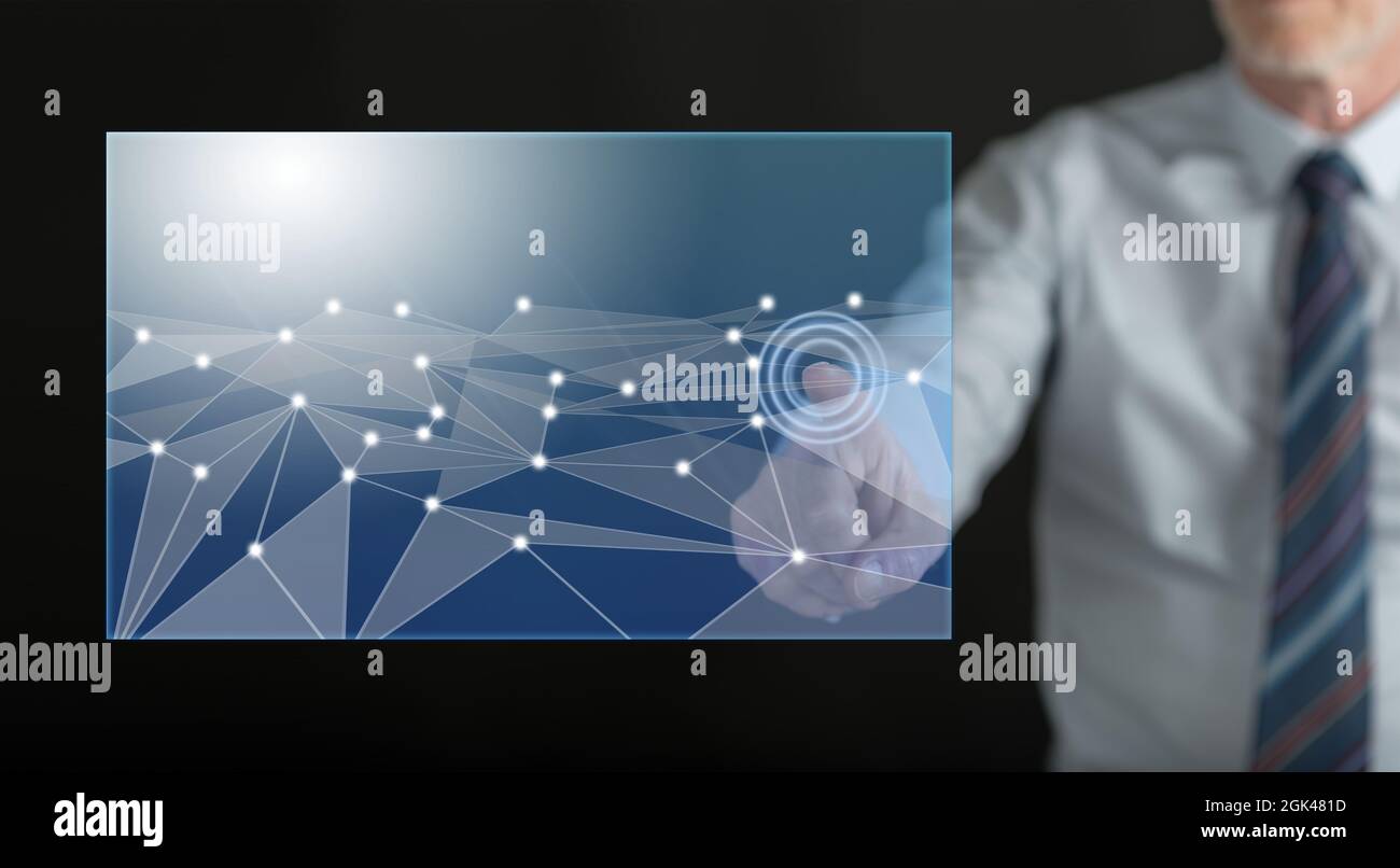 Man touching a virtual network on a touch screen with his finger Stock ...